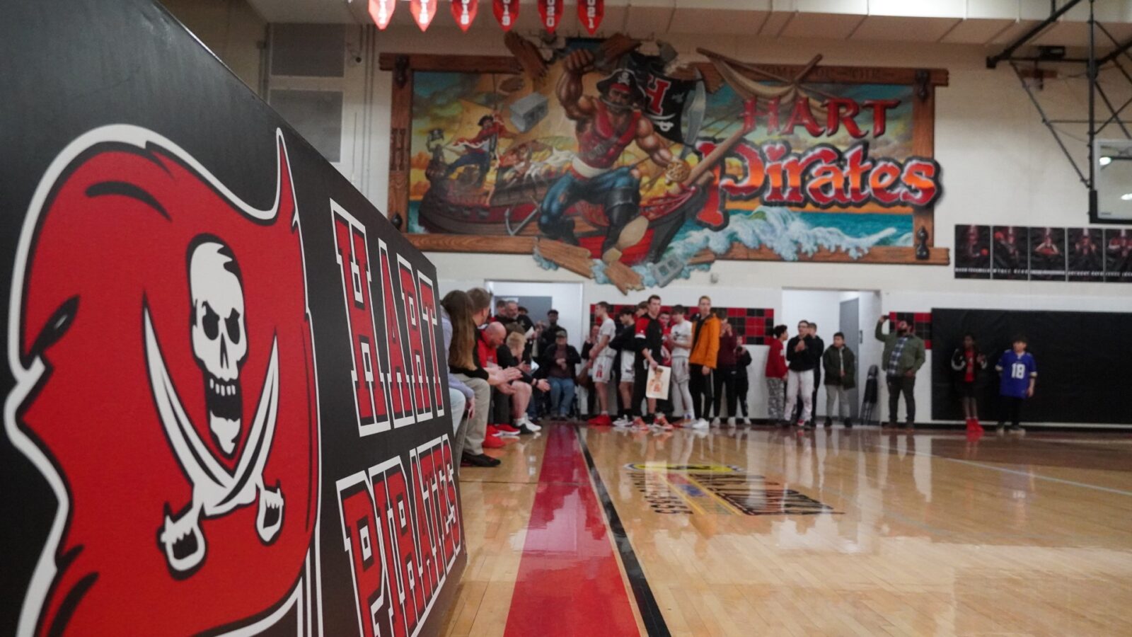 Hart’s boys basketball team joins title party, celebrates first league ...